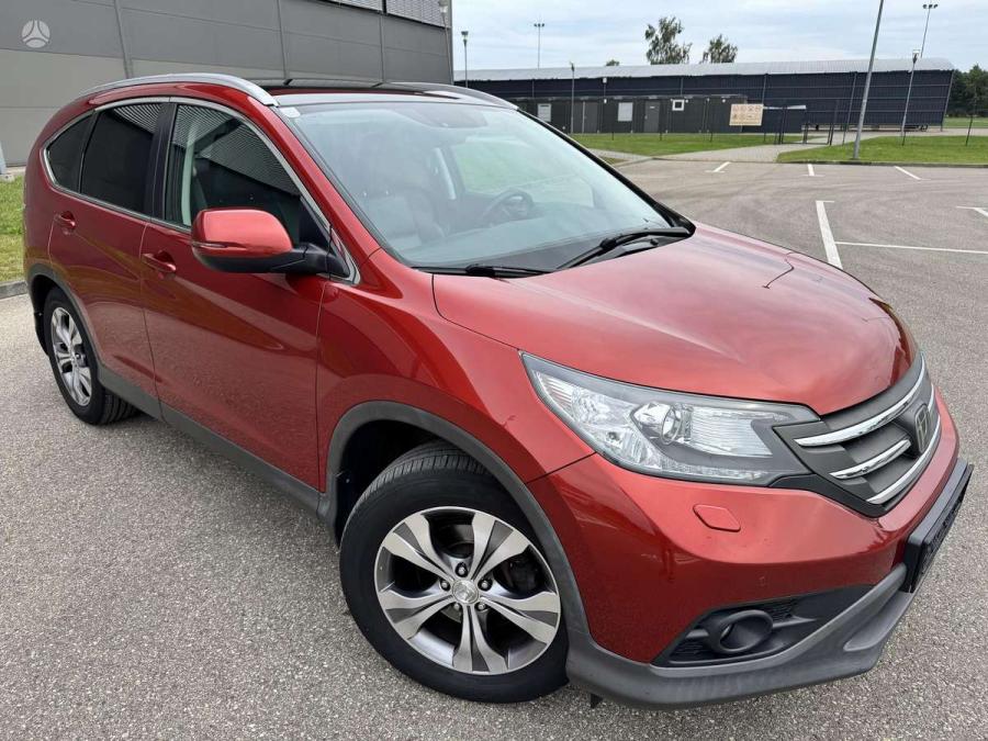 Sarkans Honda CR-V 2014 Prienai, ar dzinēja tilpumu 2.20 L un nobraukumu 260 tūkst. km par 11600 €, foto 4 vietnē AUTOMOTO.COM.LV