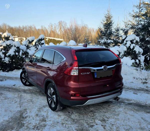 Red Honda CR-V 2015 in Utena, with an engine capacity of 1.60 L and mileage of 154 thousand km for 10850 €, photo 4 on AUTOMOTO.COM.LV