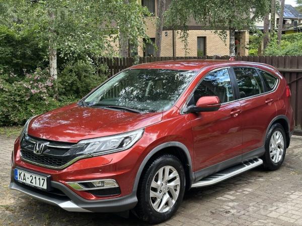 Red Honda CR-V 2015 in Riga, with an engine capacity of 2.00 L and mileage of 134 thousand km for 14900 €, photo 1 on AUTOMOTO.COM.LV