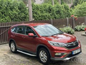 Red Honda CR-V 2015 in Riga, with an engine capacity of 2.00 L and mileage of 134 thousand km for 14900 €, photo 4 on AUTOMOTO.COM.LV