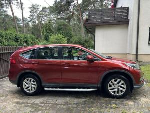 Red Honda CR-V 2015 in Riga, with an engine capacity of 2.00 L and mileage of 134 thousand km for 14900 €, photo 5 on AUTOMOTO.COM.LV