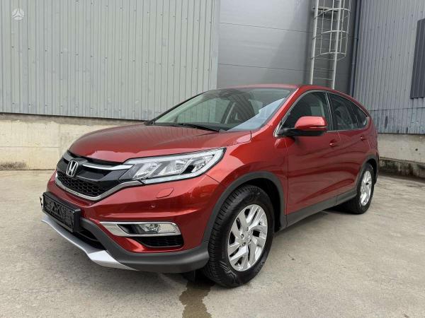 Red Honda CR-V 2015 in Alytus, with an engine capacity of 1.60 L and mileage of 149 thousand km for 11950 €, photo 1 on AUTOMOTO.COM.LV