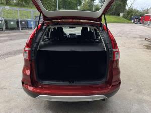 Red Honda CR-V 2015 in Alytus, with an engine capacity of 1.60 L and mileage of 149 thousand km for 11950 €, photo 6 on AUTOMOTO.COM.LV