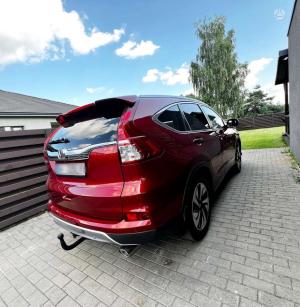 Red Honda CR-V 2016 in Vilnius, with an engine capacity of 1.60 L and mileage of 182 thousand km for 13900 €, photo 5 on AUTOMOTO.COM.LV