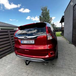 Red Honda CR-V 2016 in Vilnius, with an engine capacity of 1.60 L and mileage of 182 thousand km for 13900 €, photo 9 on AUTOMOTO.COM.LV