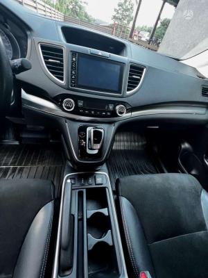 Red Honda CR-V 2016 in Vilnius, with an engine capacity of 1.60 L and mileage of 182 thousand km for 13900 €, photo 14 on AUTOMOTO.COM.LV