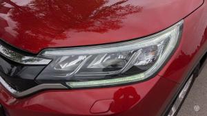 Red Honda CR-V 2016 in Klaipeda, with an engine capacity of 1.60 L and mileage of 240 thousand km for 10900 €, photo 12 on AUTOMOTO.COM.LV