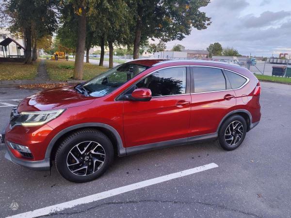 Honda CR-V 2016 in Radviliskis on AUTOMOTO.COM.LV Red Honda CR-V 2016 in Radviliskis, with an engine capacity of 1.60 L and mileage of 250 thousand km for 9990 €, photo 5 on AUTOMOTO.COM.LV