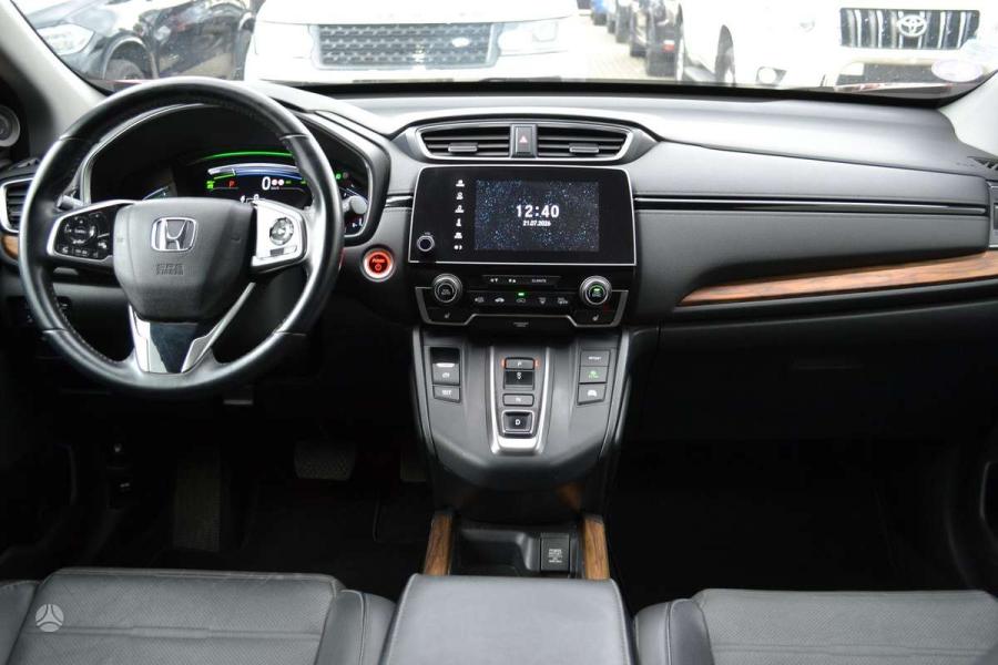 Red Honda CR-V 2019 in Vilnius, with an engine capacity of 1.99 L and mileage of 164 thousand km for 21000 €, photo 12 on AUTOMOTO.COM.LV