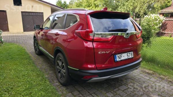 Red Honda CR-V 2022 in Riga, with an engine capacity of 2.00 L and mileage of 45 thousand km for 29500 €, photo 3 on AUTOMOTO.COM.LV