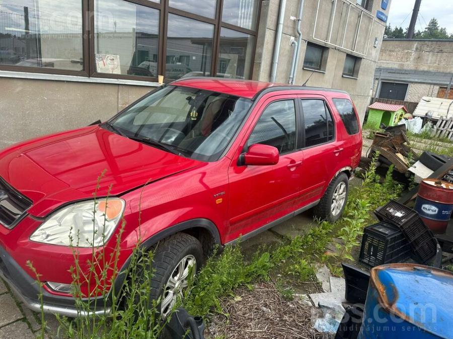 Red Honda CR-V 2003 in Riga, with an engine capacity of 2.00 L and mileage of 313 thousand km for 700 €, photo 4 on AUTOMOTO.COM.LV