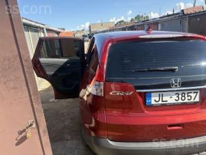 Sarkans Honda CR-V 2013 Liepāja, ar dzinēja tilpumu 2.20 L un nobraukumu 245 tūkst. km par 10000 €, foto 7 vietnē AUTOMOTO.COM.LV