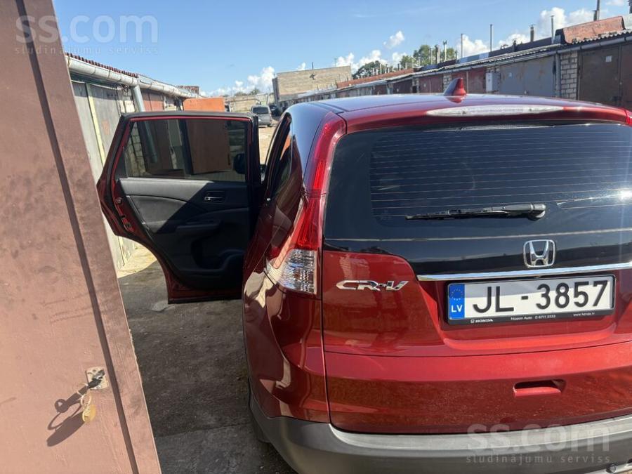Sarkans Honda CR-V 2013 Liepāja, ar dzinēja tilpumu 2.20 L un nobraukumu 245 tūkst. km par 10000 €, foto 7 vietnē AUTOMOTO.COM.LV