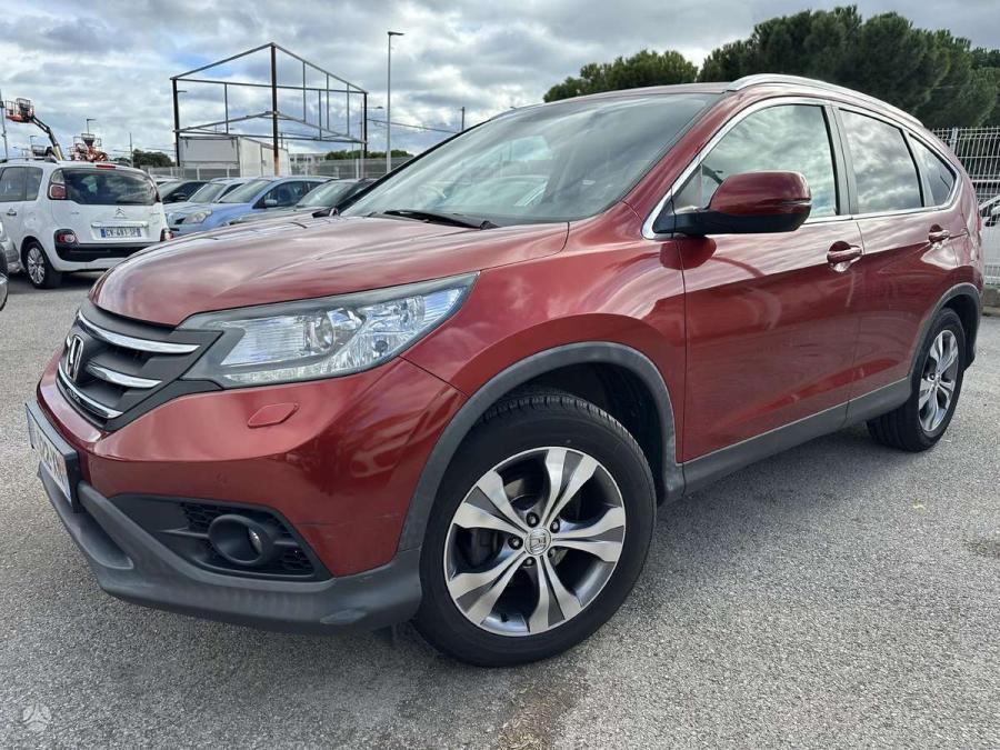 Red Honda CR-V 2014 in Kaunas, with an engine capacity of 1.60 L and mileage of 146 thousand km for 11990 €, photo 1 on AUTOMOTO.COM.LV
