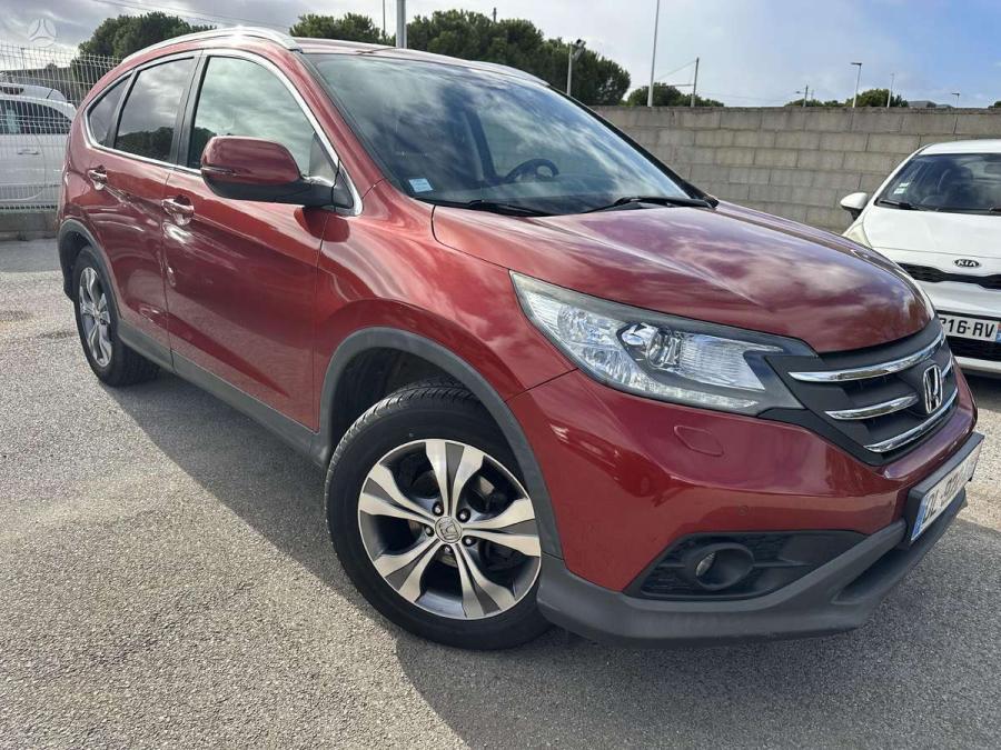 Red Honda CR-V 2014 in Kaunas, with an engine capacity of 1.60 L and mileage of 146 thousand km for 11990 €, photo 2 on AUTOMOTO.COM.LV