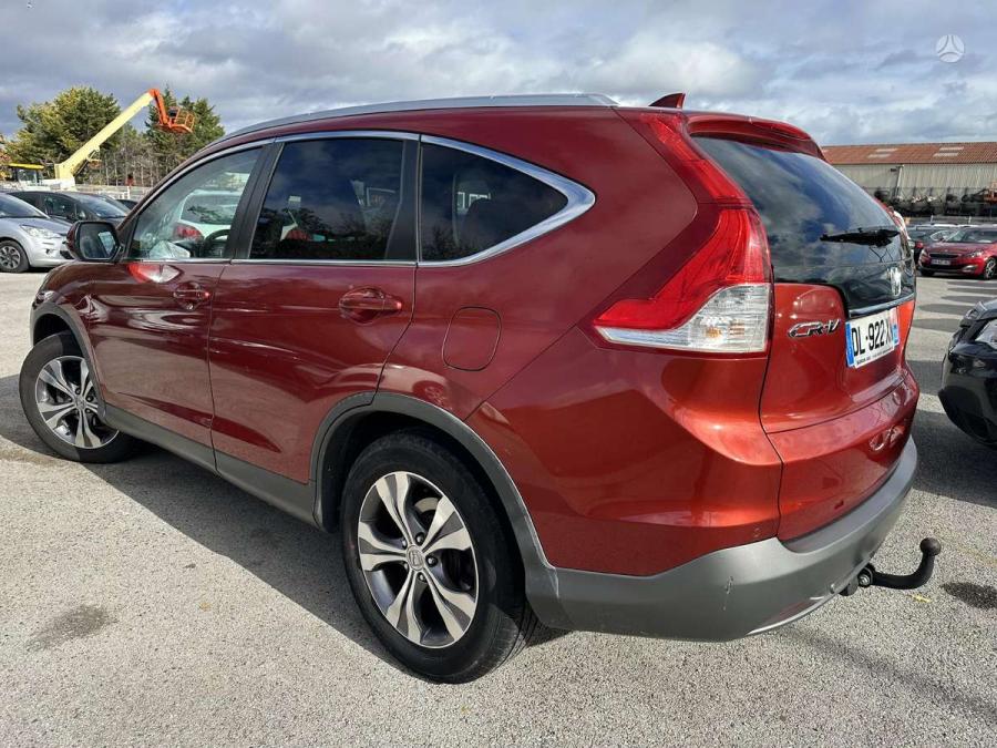 Red Honda CR-V 2014 in Kaunas, with an engine capacity of 1.60 L and mileage of 146 thousand km for 11990 €, photo 3 on AUTOMOTO.COM.LV