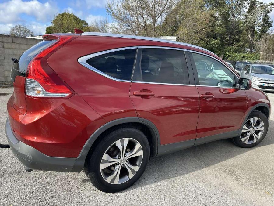 Red Honda CR-V 2014 in Kaunas, with an engine capacity of 1.60 L and mileage of 146 thousand km for 11990 €, photo 4 on AUTOMOTO.COM.LV