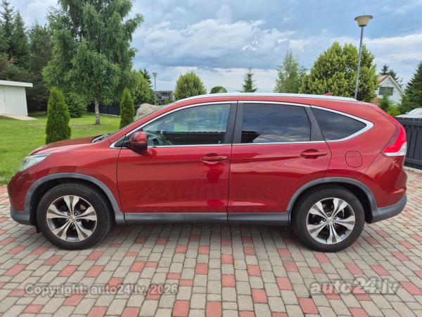 Red Honda CR-V 2012 in Tallinn, with an engine capacity of 2.00 L and mileage of 205 thousand km for 9800 €, photo 1 on AUTOMOTO.COM.LV