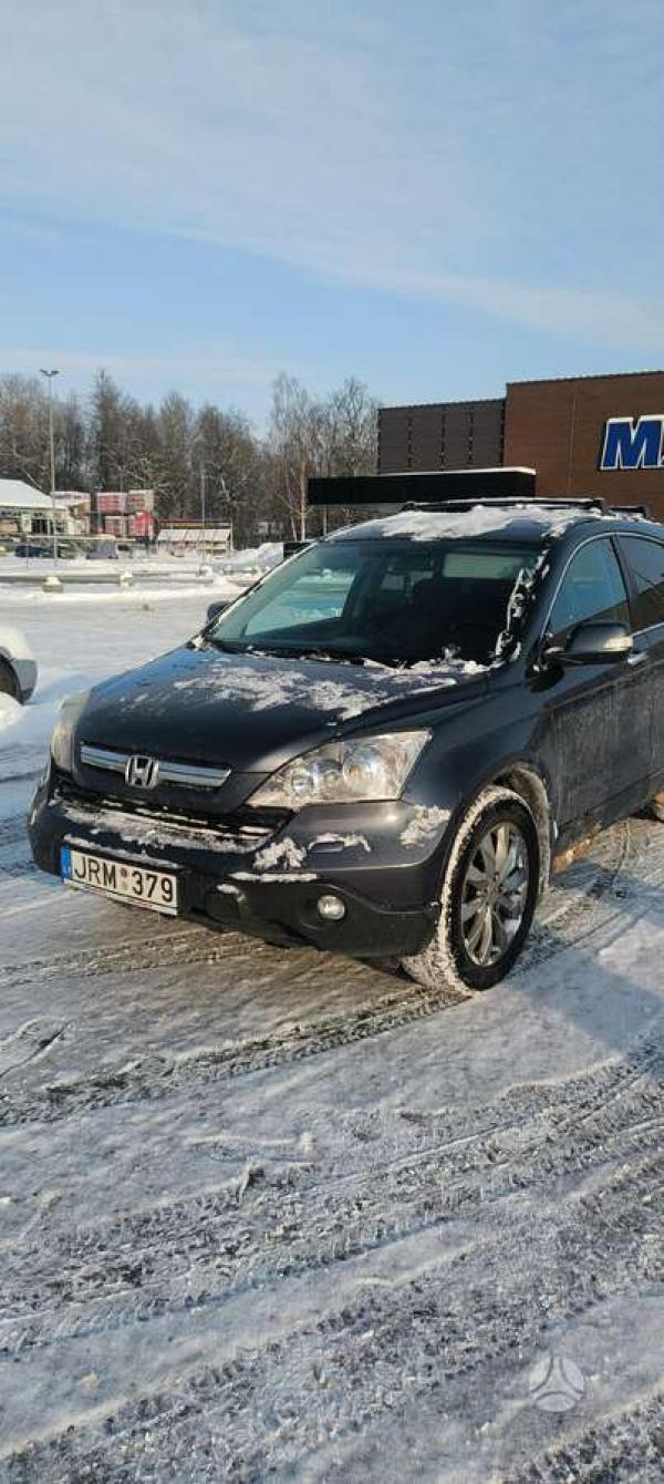 Violet Honda CR-V 2007 in Vilnius, with an engine capacity of 2.20 L and mileage of 310 thousand km for 3800 €, photo 1 on AUTOMOTO.COM.LV