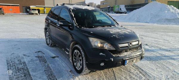 Violet Honda CR-V 2007 in Vilnius, with an engine capacity of 2.20 L and mileage of 310 thousand km for 3800 €, photo 4 on AUTOMOTO.COM.LV