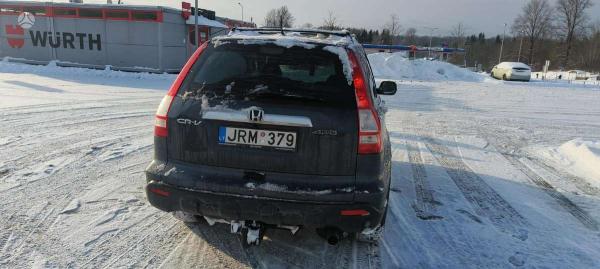 Violet Honda CR-V 2007 in Vilnius, with an engine capacity of 2.20 L and mileage of 310 thousand km for 3800 €, photo 7 on AUTOMOTO.COM.LV