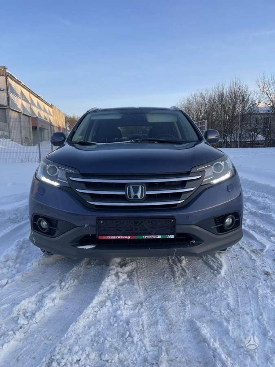 Violet Honda CR-V 2014 in Kaunas, with an engine capacity of 2.20 L and mileage of 285 thousand km for 9250 €, photo 3 on AUTOMOTO.COM.LV