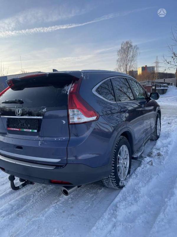 Violet Honda CR-V 2014 in Kaunas, with an engine capacity of 2.20 L and mileage of 285 thousand km for 9250 €, photo 6 on AUTOMOTO.COM.LV