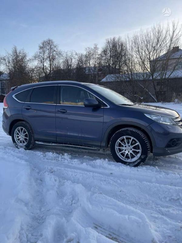 Violet Honda CR-V 2014 in Kaunas, with an engine capacity of 2.20 L and mileage of 285 thousand km for 9250 €, photo 7 on AUTOMOTO.COM.LV