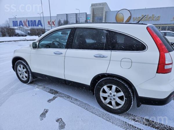 White Honda CR-V 2008 in Jelgava, with an engine capacity of 2.00 L and mileage of 270 thousand km for 4999 €, photo 7 on AUTOMOTO.COM.LV