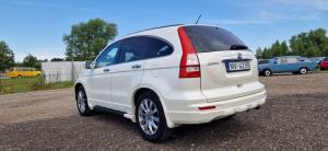 White Honda CR-V 2010 in Riga, with an engine capacity of 2.20 L and mileage of 248 thousand km for 7250 €, photo 35 on AUTOMOTO.COM.LV