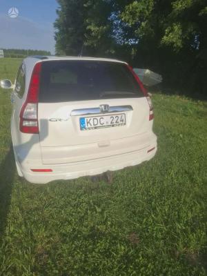 White Honda CR-V 2010 in Panevezys, with an engine capacity of 2.20 L and mileage of 278 thousand km for 5850 €, photo 6 on AUTOMOTO.COM.LV
