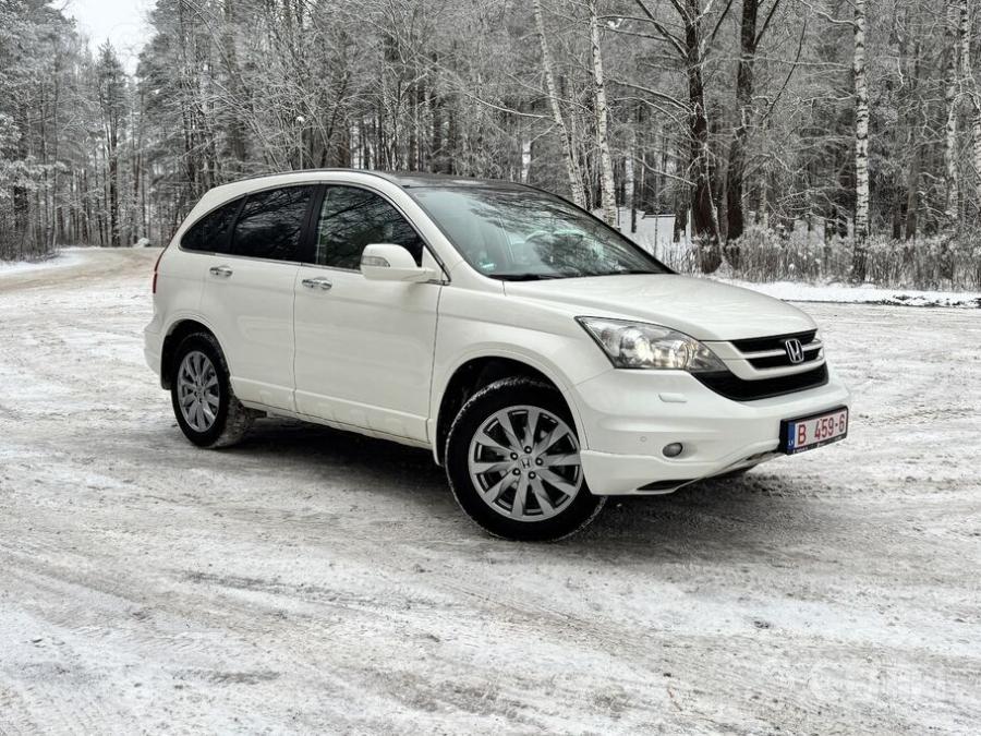 White Honda CR-V 2011 in Riga, with an engine capacity of 2.20 L and mileage of 0 thousand km for 7990 €, photo 8 on AUTOMOTO.COM.LV