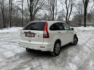 White Honda CR-V 2011 in Riga, with an engine capacity of 2.20 L and mileage of 0 thousand km for 7990 €, photo 10 on AUTOMOTO.COM.LV