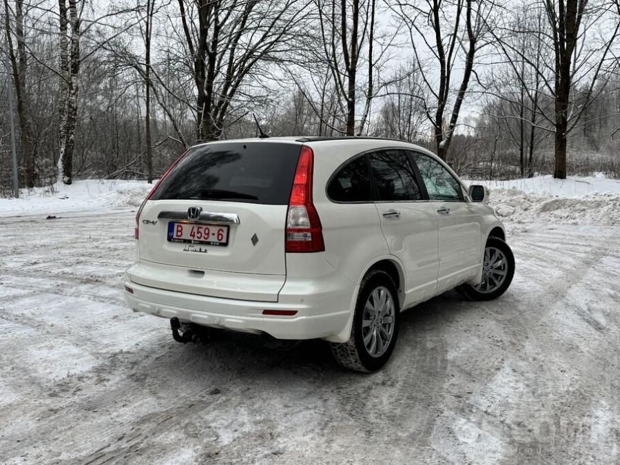White Honda CR-V 2011 in Riga, with an engine capacity of 2.20 L and mileage of 0 thousand km for 7990 €, photo 10 on AUTOMOTO.COM.LV