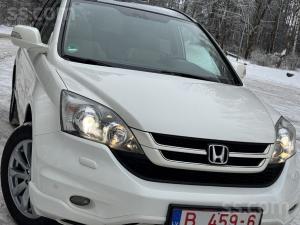 White Honda CR-V 2011 in Riga, with an engine capacity of 2.20 L and mileage of 0 thousand km for 7990 €, photo 12 on AUTOMOTO.COM.LV