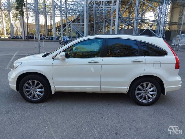 White Honda CR-V 2011 in Druskininkai, with an engine capacity of 2.20 L and mileage of 244 thousand km for 8200 €, photo 6 on AUTOMOTO.COM.LV