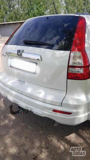 White Honda CR-V 2012 in Moletai, with an engine capacity of 2.20 L and mileage of 224 thousand km for 7199 €, photo 4 on AUTOMOTO.COM.LV