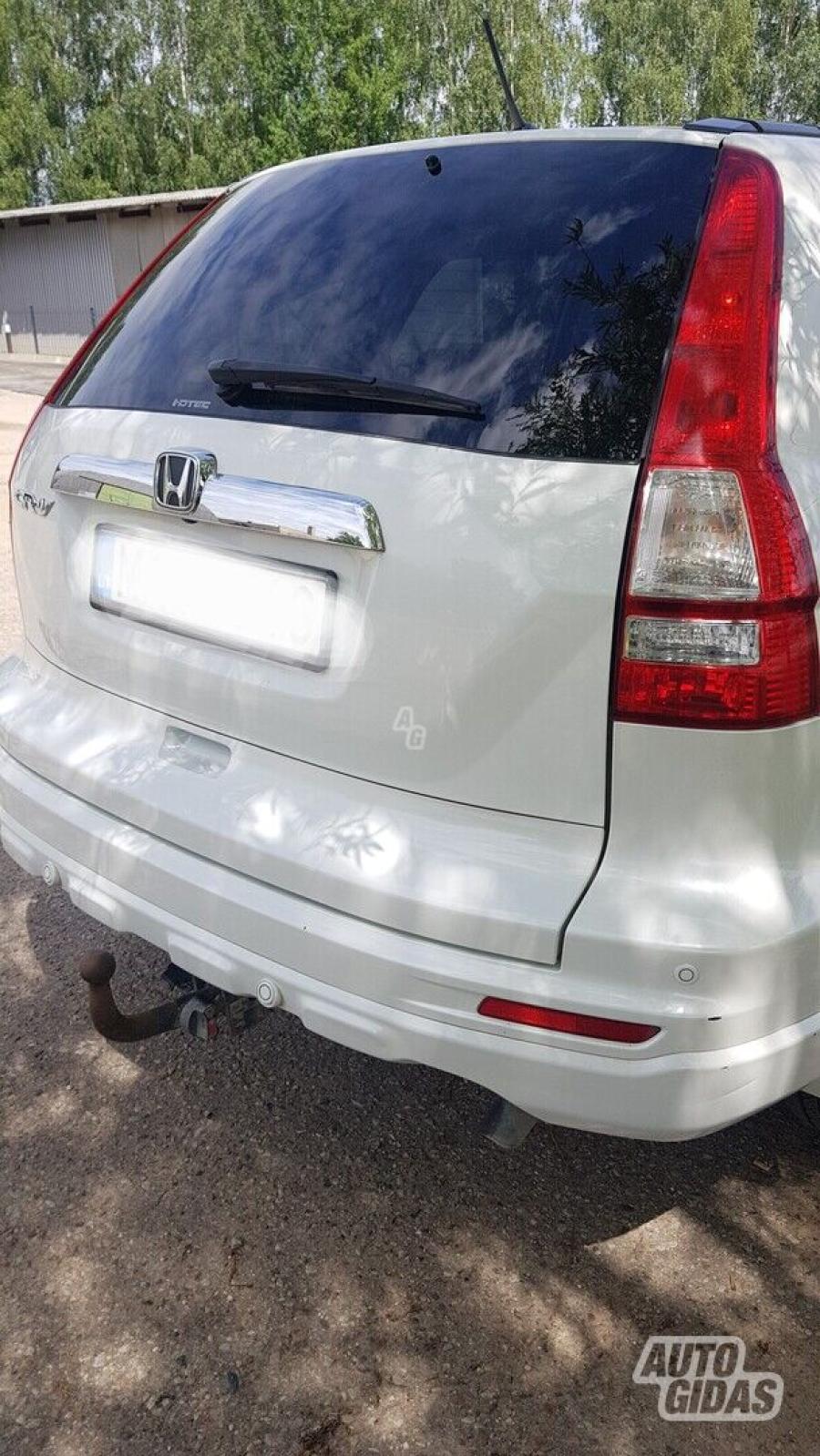 White Honda CR-V 2012 in Moletai, with an engine capacity of 2.20 L and mileage of 224 thousand km for 7199 €, photo 4 on AUTOMOTO.COM.LV