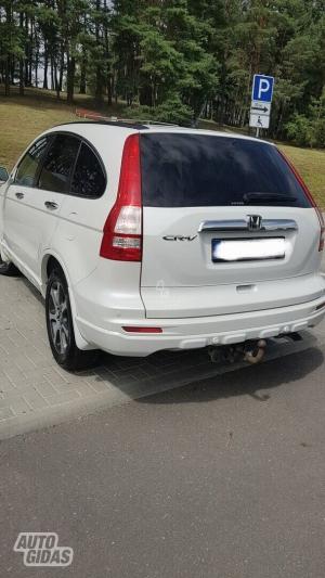White Honda CR-V 2012 in Moletai, with an engine capacity of 2.20 L and mileage of 224 thousand km for 7199 €, photo 5 on AUTOMOTO.COM.LV