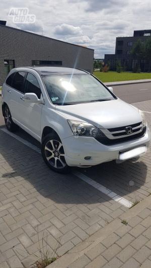 White Honda CR-V 2012 in Moletai, with an engine capacity of 2.20 L and mileage of 224 thousand km for 7199 €, photo 7 on AUTOMOTO.COM.LV
