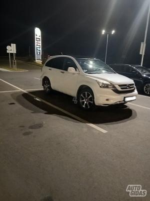 White Honda CR-V 2012 in Moletai, with an engine capacity of 2.20 L and mileage of 224 thousand km for 7199 €, photo 8 on AUTOMOTO.COM.LV