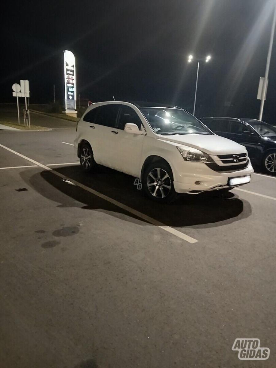 White Honda CR-V 2012 in Moletai, with an engine capacity of 2.20 L and mileage of 224 thousand km for 7199 €, photo 8 on AUTOMOTO.COM.LV