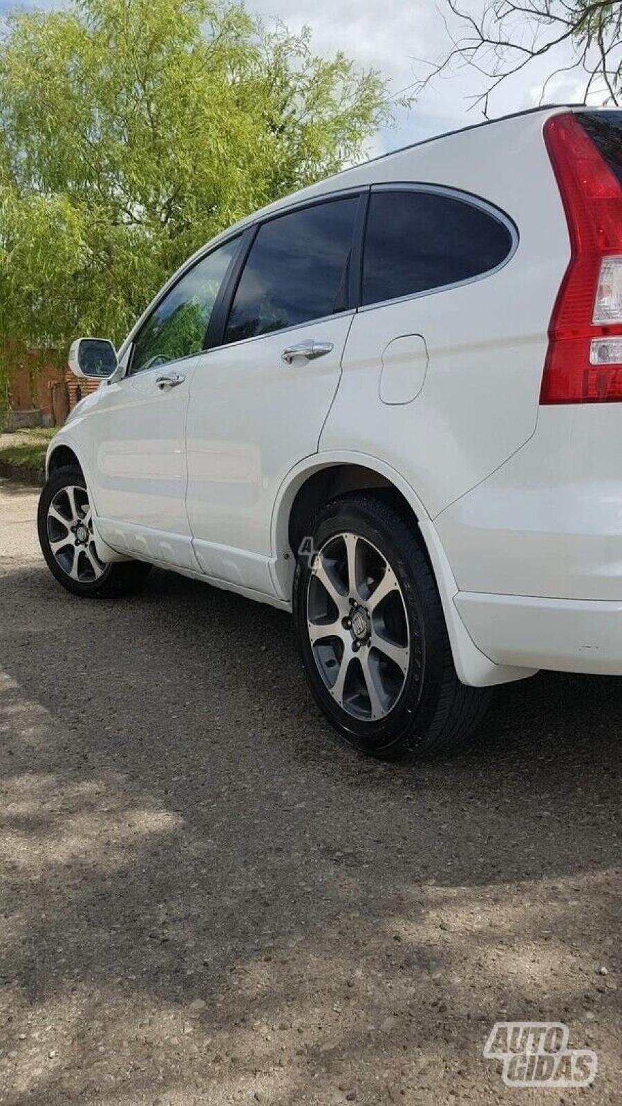 White Honda CR-V 2012 in Moletai, with an engine capacity of 2.20 L and mileage of 224 thousand km for 7199 €, photo 10 on AUTOMOTO.COM.LV