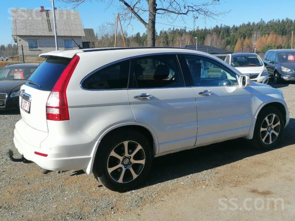 White Honda CR-V 2012 in Valmiera, with an engine capacity of 2.20 L and mileage of 244 thousand km for 7990 €, photo 7 on AUTOMOTO.COM.LV