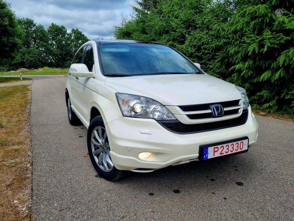White Honda CR-V 2012 in Vilnius, with an engine capacity of 2.20 L and mileage of 152 thousand km for 9650 €, photo 4 on AUTOMOTO.COM.LV