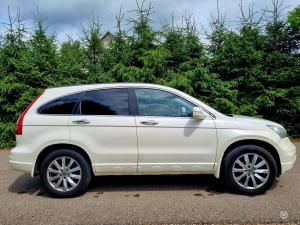 White Honda CR-V 2012 in Vilnius, with an engine capacity of 2.20 L and mileage of 152 thousand km for 9650 €, photo 9 on AUTOMOTO.COM.LV
