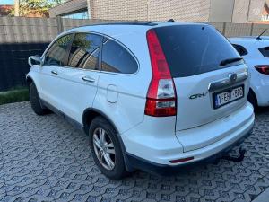 White Honda CR-V 2012 in Siauliai, with an engine capacity of 2.20 L and mileage of 214 thousand km for 7700 €, photo 4 on AUTOMOTO.COM.LV