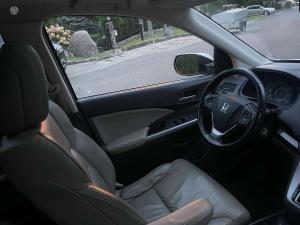 White Honda CR-V 2012 in Vilnius, with an engine capacity of 2.35 L and mileage of 266 thousand km for 8250 €, photo 12 on AUTOMOTO.COM.LV