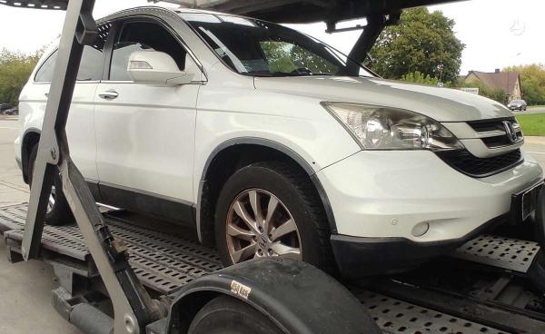 White Honda CR-V 2012 in Vilnius, with an engine capacity of 2.00 L and mileage of 95 thousand km for 11999 €, photo 7 on AUTOMOTO.COM.LV