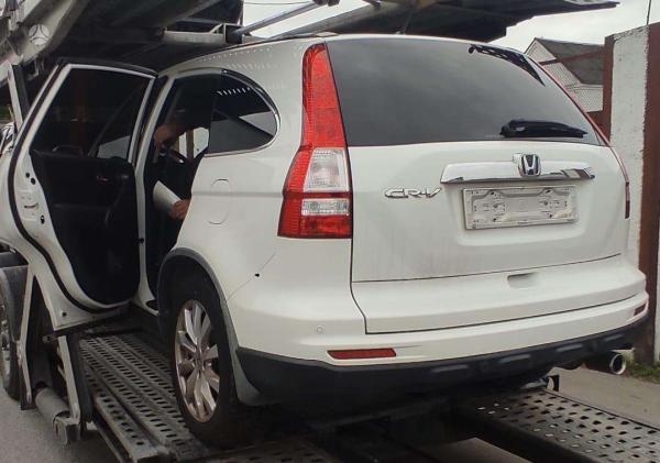 White Honda CR-V 2012 in Vilnius, with an engine capacity of 2.00 L and mileage of 95 thousand km for 11999 €, photo 8 on AUTOMOTO.COM.LV